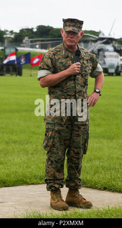 Retired Marine Major General James L. Day listens to U.S. President ...