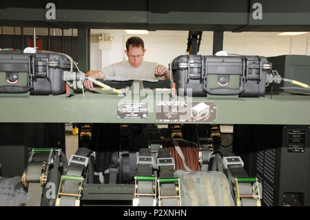 Airmen assigned to the 134th Air Control Squadron check equipment ...