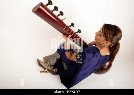 Sitar in playing position Stock Photo - Alamy