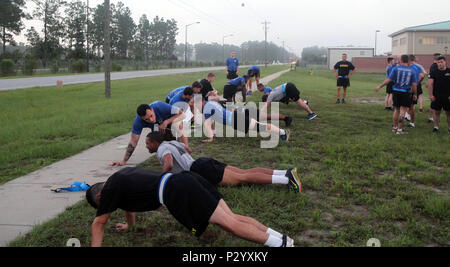 U.S. Army soldiers perform push ups during physical training at the ...
