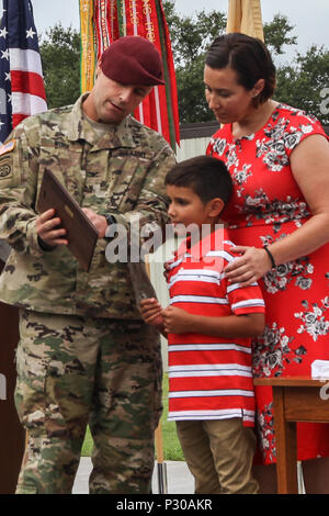 A plaque for the Staff Sgt. Edwardo Loredo Child Development Center ...