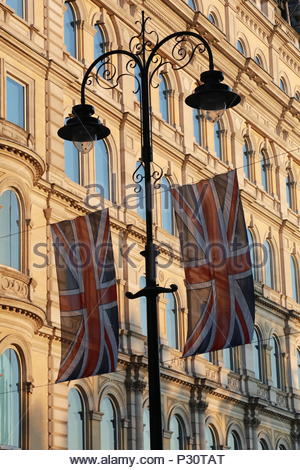 Closeup of row of national flags hanging in London, UK, United Kingdom ...