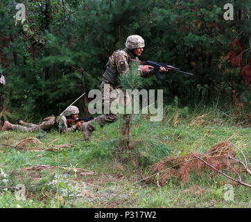"Battle buddy, cover me while I move," A Soldier with E Company, 2nd ...