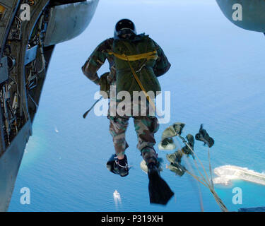 A U.S. Army EOD Technician from 53rd Ordnance Company (EOD) clears a ...