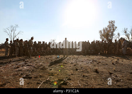 Colonel Kevin Norton, commanding officer of 4th Marine Regiment, awards ...