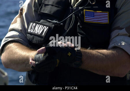 US Navy A boarding team member aboard the U.S. Coast Guard Cutter Adak ...