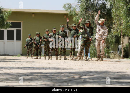 Zeravani, a specialized branch of the Peshmerga soldiers, conduct a ...