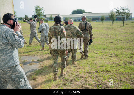 U.S. Soldiers with 650th Military Intelligence Group check the filters ...