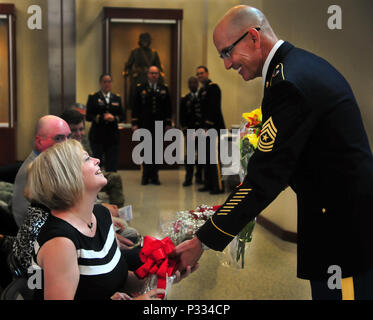 Col. Charles E. Newbegin is presented with a U.S. Flag July 22, 2016 at ...