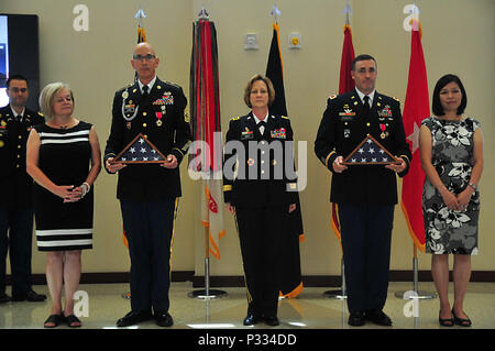 Col. Charles E. Newbegin is presented with a U.S. Flag July 22, 2016 at ...