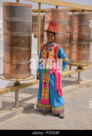 Traditional dress of the Yugur ethnic minority, Mati Si, Gansu, China ...