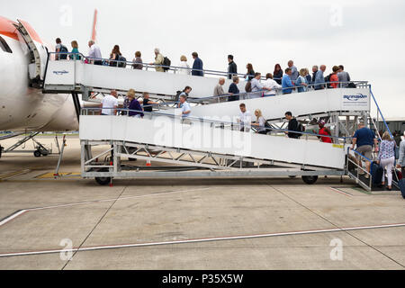 Bristol Airport, UK. Passengers board an Easyjet aircraft using an ...