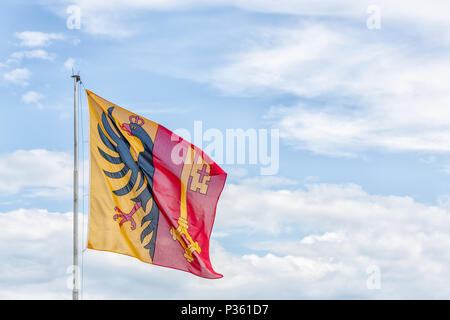 Geneva city, Switzerland. Flag with coat of arms mounted on old Stock ...