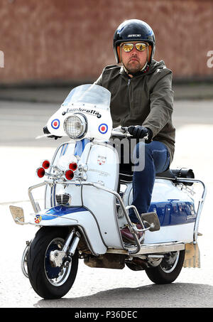 Vespa enthusiasts arrive for the gala dinner in Belfast as thousands of ...