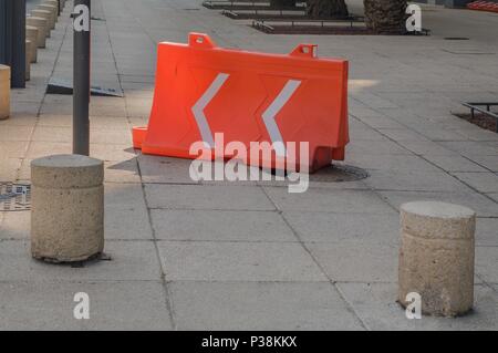 Broken culvert covered with an orange plastic structure used in ...