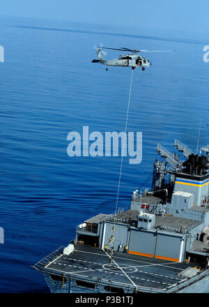 The U.S. Navy Supply-class fast combat support ship USNS Supply (left ...