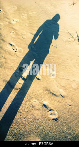 Long legs shadow Stock Photo - Alamy