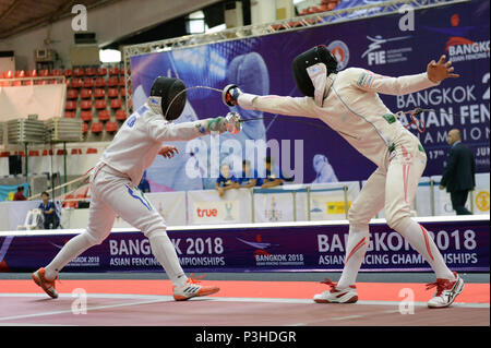 Koki Kano of Japan fights against Dmitriy Alexanin of Kazakhstan at the ...