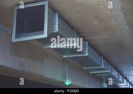 Fire exhauster in a multi-level parking building Stock Photo - Alamy