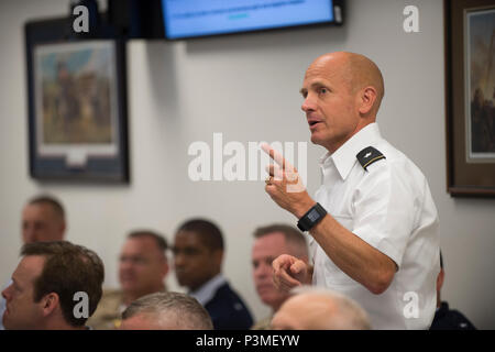 U.S. Army Brig. Gen Ron Stephens, RHCE's Commanding General, awards the ...