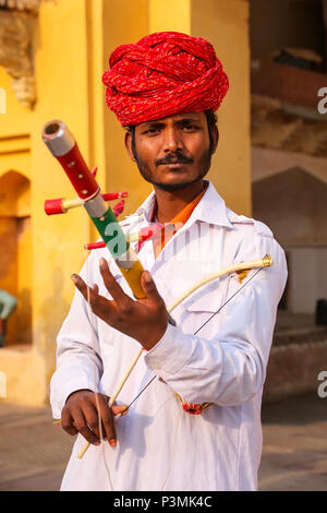 Local man playing ravanahatha in Jaleb Chowk, Amber Fort, Rajasthan ...