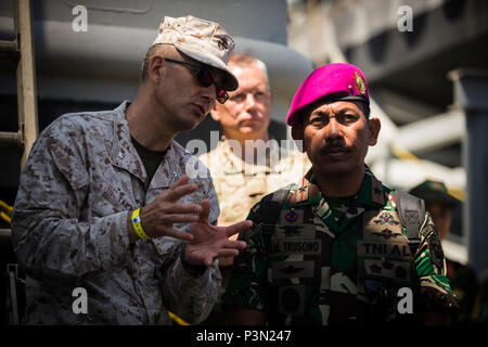 U.S. Marine Corps Col. Koichi Takagi (left), incoming commander of II ...