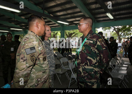 The 7th Infantry Division commander Maj. Gen. Terry Ferrell chats with ...