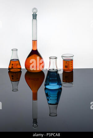 laboratory flasks and test tube containing liquid Stock Photo - Alamy