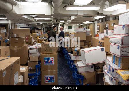Photograph of a US Navy mail call during WWII in the Pacific, capturing ...