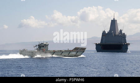 LHD Landing Craft from HMAS Canberra sail in formation off the coast of ...