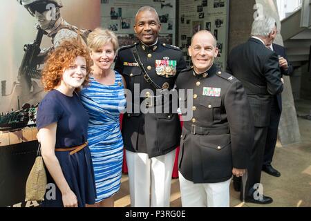 U.S. Marine Corps Lt. Sarah Faris, left, oversees Sgt. William ...