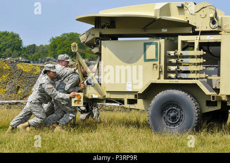 A satellite transportable terminal set up by the 558th Signal Stock ...