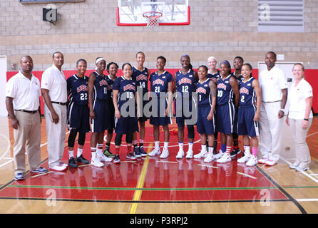 All-Marine Corps basketball team Head Coach James A. Jones bumps fists ...