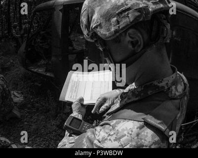 A Soldier from the 111th Quartermaster Company at Fort Lee, Va., hugs ...