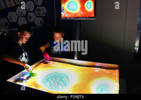 Augmented reality sandbox allows users to create topography models by ...