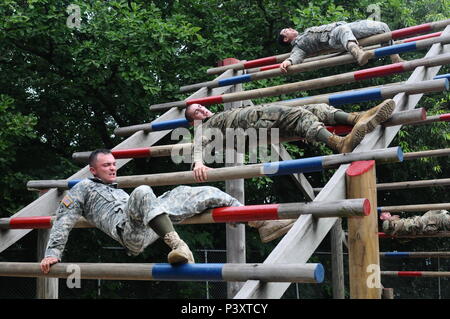 Soldiers attending the Air Assault course receive instructions after ...