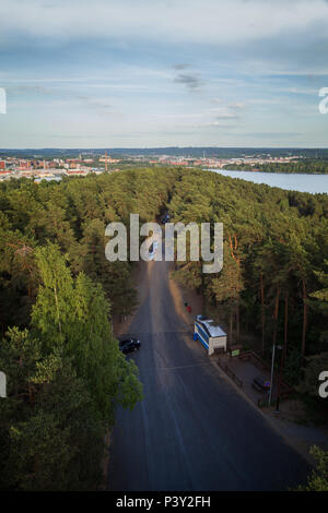 City of Tampere, Finland, and lush trees at the Pyynikki ridge viewed ...
