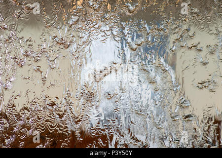 Water running down glass, ripples, patterns and reflections Stock Photo ...