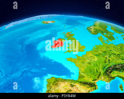 Satellite view of Ireland highlighted in red on planet Earth with ...