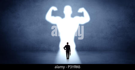 Businessman standing and dreaming about a strong superhero Stock Photo ...