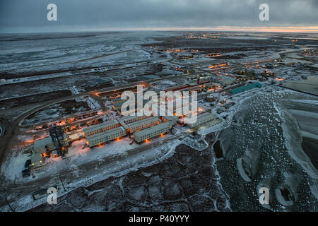 Aerial landscape view of Prudhoe Bay oil fields, central arctic coast ...