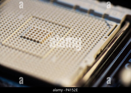 Empty CPU processor socket on motherboard toned Stock Photo - Alamy