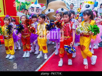 Participants in the 14th Tai Kok Tsui temple fair in Hong Kong Stock ...