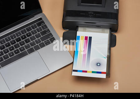 Calibration of home printer. Printer print color test paper Stock Photo ...