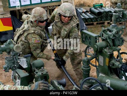 The M777 howitzer cannon loading area looking up into the muzzle. The ...