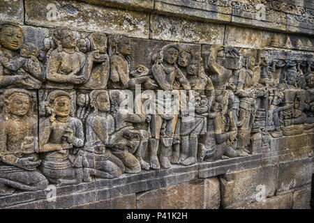 bas relief panel on a balustrade of 9th century Borobudur Buddhist ...