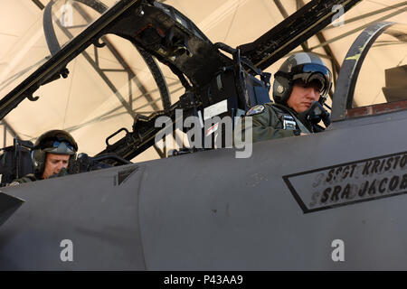 Col. Brian Afflerbaugh, 4th Operations Group commander, performs his ...