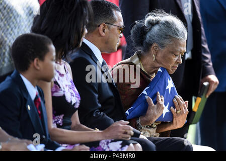 Nola Whitfield, wife of 2nd Lt. Malvin G. Whitfield, awaits the arrival ...