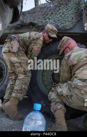 U.S Army Sgt. Chaz Johnson, an Armor Crewman assigned to 4th Squadron ...