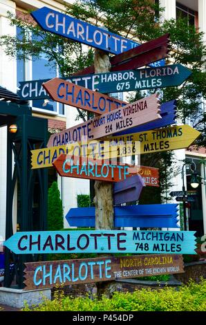 Charlotte, North Carolina - Signs in an uptown park point to other ...